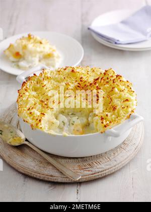 Fish pie with cheesy mash topping Stock Photo - Alamy