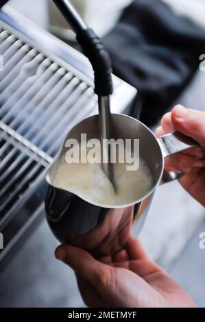 Steaming milk, step 8 Stock Photo - Alamy