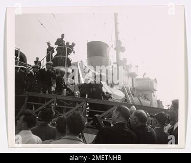 Survivors of the ditched flying boat 'Bermuda Sky Queen' are brought to ...
