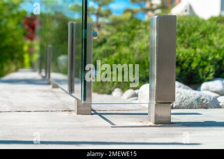 stainless steel column with glass holder Stock Photo - Alamy