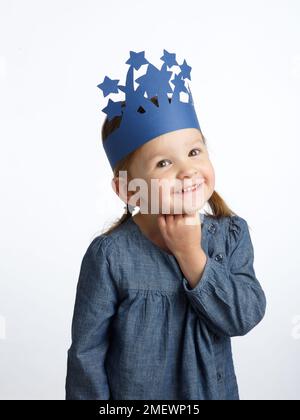 Papercraft Paper crowns Girl in star crown Stock Photo - Alamy