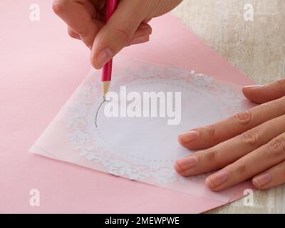 Papercraft. DIY doily guilding step 2. With template stuck in place ...