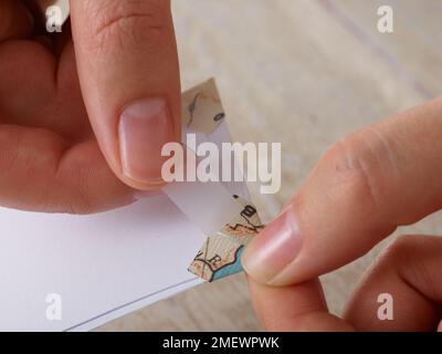 Papercraft. DIY Photo corners step 1. Fold corners of paper diagonally ...