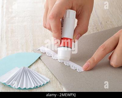 Papercraft. DIY Baby's pram, Step 5. Add glue to decorative trim Stock ...