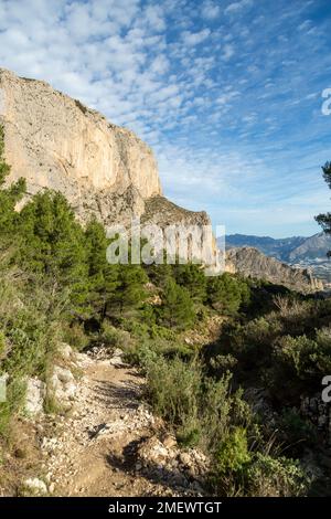 walking route PR CV 017 underneath the cliffs of Penyo Cabal Mountain ...