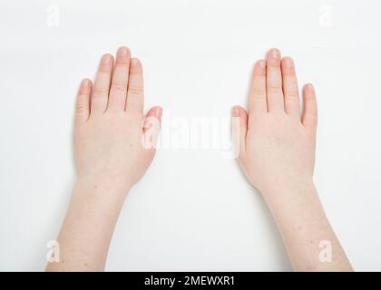 Children's hands demonstrating the movement of tectonic plates ...