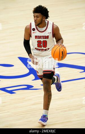 Western Kentucky guard Dayvion McKnight shoots a layup as Rice forward ...