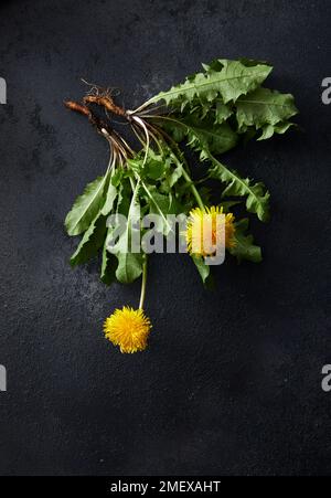 Dandelion tea background, herbal remedy. Dandelion tea, flower, leaves ...