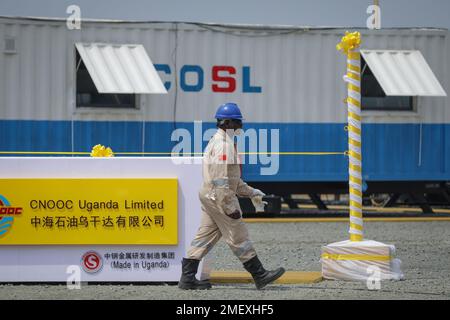 A Ugandan worker from China Oilfield Services Limited (COSL), a ...