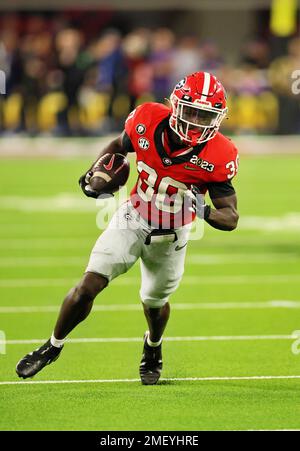 Georgia running back Daijun Edwards (30) runs away from Tennessee ...