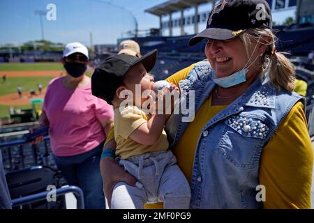Pittsburgh Pirates coach Christian Marrero talks with Oneil Cruz (15 ...