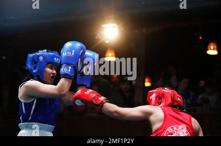 Nepalese women boxers participate in a boxing match organized to mark ...