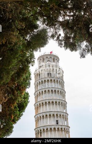 Close up of iconic leaning tower of Pisa with white sky, Tuscany, Italy ...