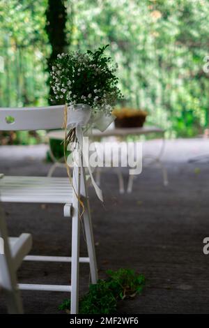 Wedding decoration. White stools for bride and groom Stock Photo - Alamy