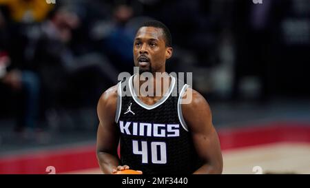 Sacramento Kings forward Harrison Barnes (40) talks with referee Mousa ...