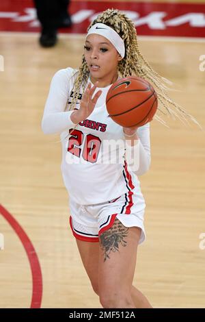 St. John's forward Rayven Peeples (20) untangles herself from ...