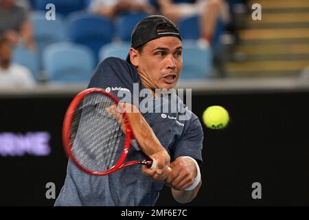 Australia's Alex Bolt makes a backhand return to Switzerland's Stan ...