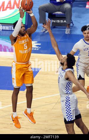 Kentucky's Jacob Toppin (0) shoots while defended by Duquesne's Tre ...