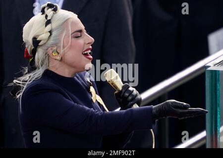 Lady Gaga sings the National Anthem during the 59th Presidential ...
