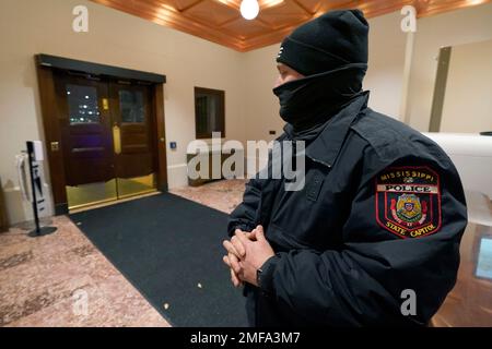 Armed police officer at main entrance gates to the Balmoral Estate ...