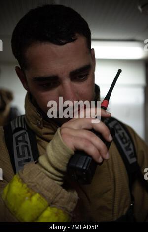 Fire Control Technician Second Class (FT2) Matthew Beaker stands watch ...