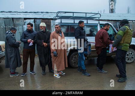Indian forces frisk civilians during shutdown against the killing of ...