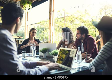 Female Designers Having Brainstorming Meeting In Office Stock Photo - Alamy