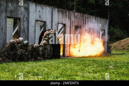 Indiana Guardsmen with the 776th Engineer Battalion, blast through ...