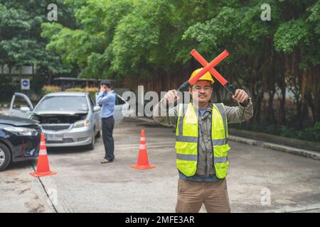 Traffic Man directing traffic after Crash Accident on the Road. Traffic ...