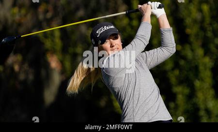 Bronte Law, of England, hits from a sand trap on the eighth fairway ...
