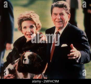 President Ronald Reagan, Nancy Reagan, and Rex in the residence during ...
