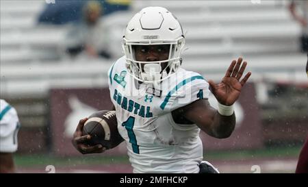Coastal Carolina's CJ Marable (1) runs for a long gain against Texas ...