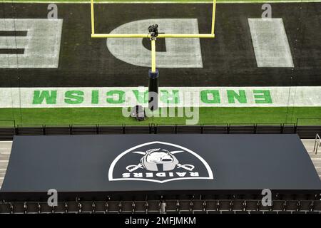 End Racism is written in the end zone before an NFL football game ...