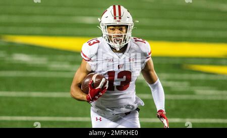 Wisconsin wide receiver Chimere Dike (13) runs the ball against ...