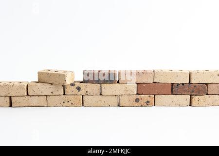 A pattern of brown, white bricks isolated on white background Stock ...