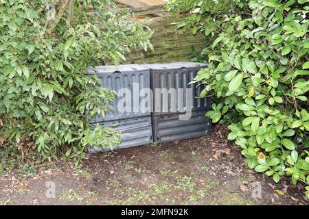 Compost silos in the backyard. Two different sizes Stock Photo - Alamy