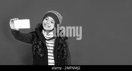 glad blogging teen girl in studio. photo of teen girl blogging. teen ...