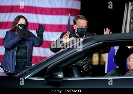Sen. Gary Peters, D-Mich., and his wife, Colleen Ochoa, greet ...