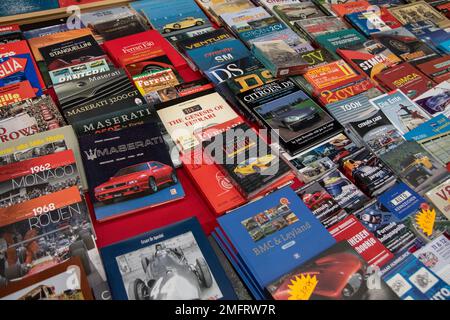 Various pocket books for sale about automobile models at a car show ...