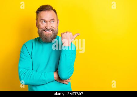 Photo of positive groomed man wear stylish clothes speak telephone arm ...