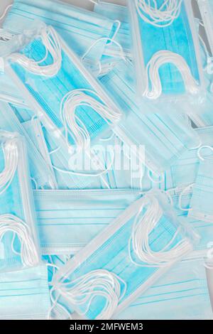 surgical masks wallpaper in top view on flat lay blue background Stock ...