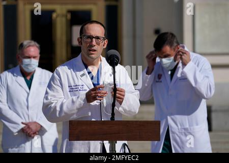 Dr. Brian Garibaldi, talks with reporters at Walter Reed National ...