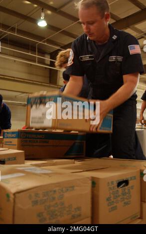 Coast Guard Personnel - Supplies - 26-HK-84-179. Hurricane Katrina ...
