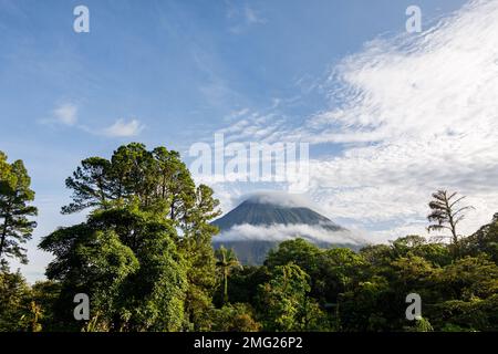 Primary and secondary tropical rainforests surround Arenal Volcano at ...