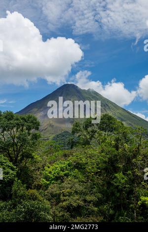 Primary and secondary tropical rainforests surround Arenal Volcano at ...