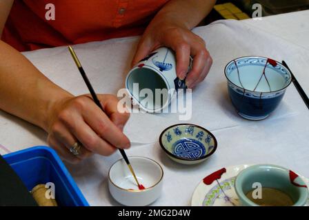 Kintsugi ("golden joinery") is Japanese art of repairing broken pottery ...