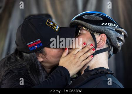U.S. Army Capt. Luis Avila and his son Miguel Avila approach the ...