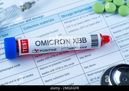 Test tube labelled "OMICRON XBB variant test positive Stock Photo - Alamy