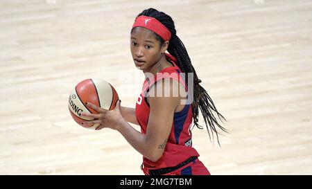 Washington Mystics guard Stella Johnson brings the ball up the court ...