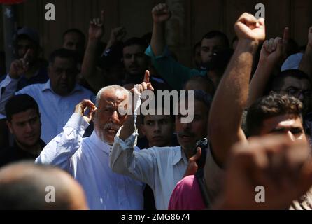 Palestinian supporters of Islamic Jihad raise their fingers up while ...